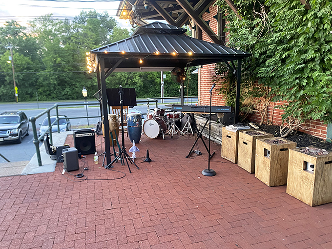 The outdoor stage where food comas give way to foot-tapping as evening falls. Music and meals&mdash;the perfect pairing since humans first gathered around fires.