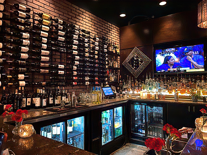 A wall of bottles that says "we take our wine seriously" without the sommelier intimidation factor.