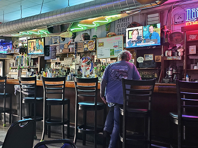 The bar at The View isn't just where drinks are served - it's the community's living room where conversations flow as freely as the beer.