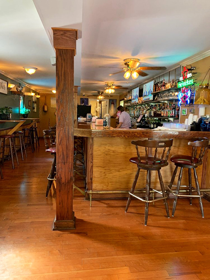 The bar area invites you to settle in and stay awhile. Those barstools have heard some stories&mdash;and seen some empty plates.