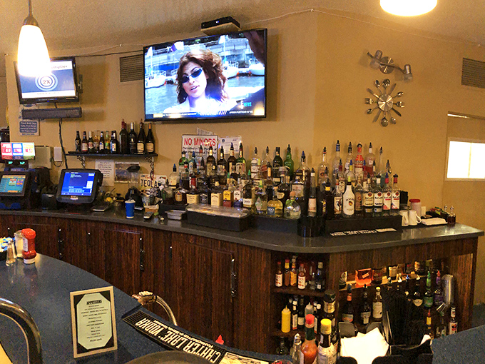 The bar area stands ready for evening revelry &ndash; proof that Waffle Hut & Eatery understands life's greatest pleasures don't end when breakfast service concludes.