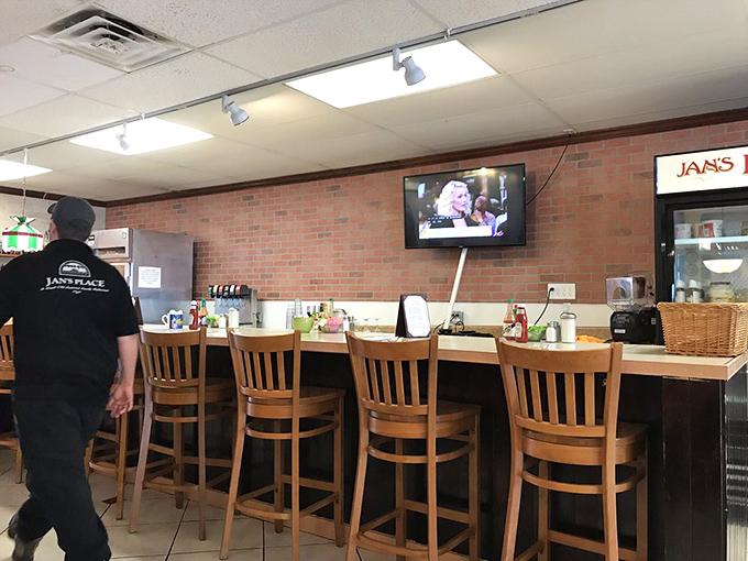 Counter seating: where solo diners become regulars, coffee refills appear magically, and you can watch breakfast ballet performed by seasoned short-order veterans.