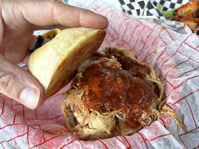 A pulled pork sandwich that doesn't need fancy garnishes or artisanal bread&mdash;just meat that's clearly lived its best second life.