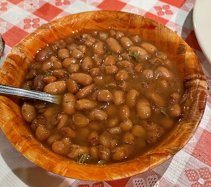 These aren't ordinary beans&mdash;they're the result of a secret spice blend and slow-cooking alchemy that transforms humble legumes into cowboy caviar.