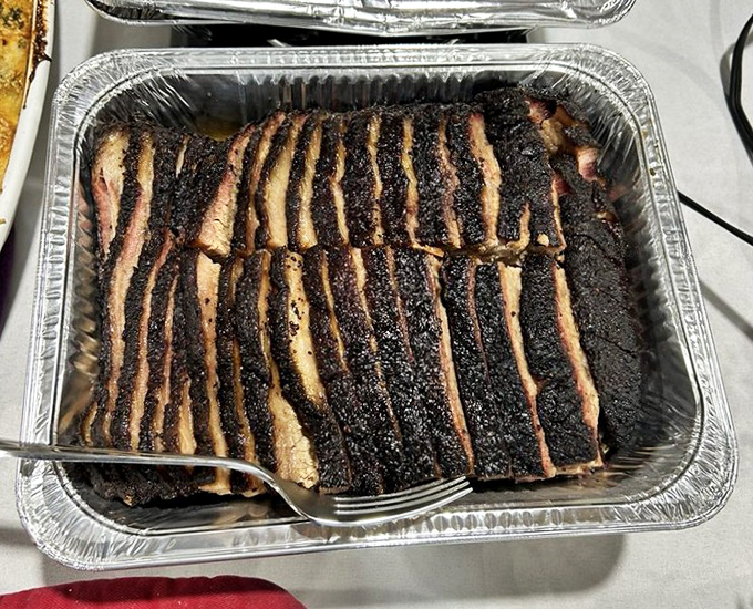 Brisket sliced against the grain reveals the telltale pink smoke ring &ndash; barbecue's equivalent of Olympic gold.