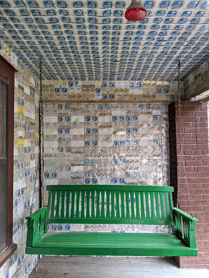 This ingenious porch swing surrounded by beer packaging creates a surprisingly serene spot to contemplate the thin line between hoarding and art.
