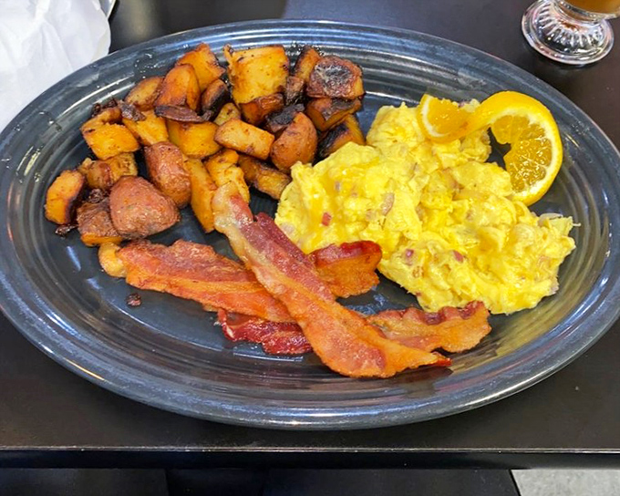 The breakfast of champions who aren't planning to eat again until tomorrow. Golden potatoes, perfectly cooked eggs, and bacon that's achieved crispy nirvana.
