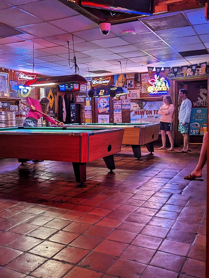 Pool sharks circle the tables while neon beer signs cast their approving glow. Some of life's greatest decisions have been made during friendly games here.