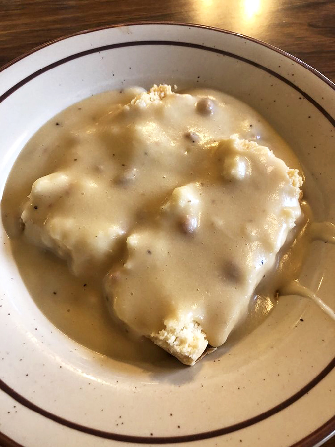 Biscuits drowning in sausage gravy - Southern comfort food that transcends all geographical and cultural boundaries.