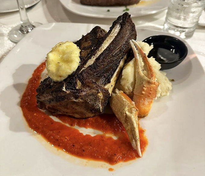 Bone-in brilliance on a pool of vibrant sauce. When meat and seafood join forces, resistance becomes entirely futile.