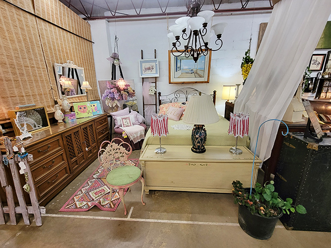 Shabby chic paradise in pastel perfection. This dreamy bedroom vignette with its distressed yellow dresser whispers "slow mornings" and "breakfast in bed."