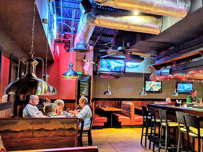 The dining area's warm lighting and comfortable seating create the perfect backdrop for the main event happening on your plate.