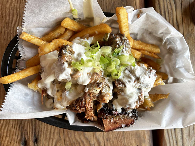 Brisket queso fries: where French cuisine meets Texas tradition in a glorious pile that renders forks completely unnecessary.