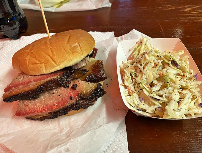 A brisket sandwich with slaw sidekick &ndash; the Batman and Robin of Texas lunch options, fighting hunger crimes one bite at time.