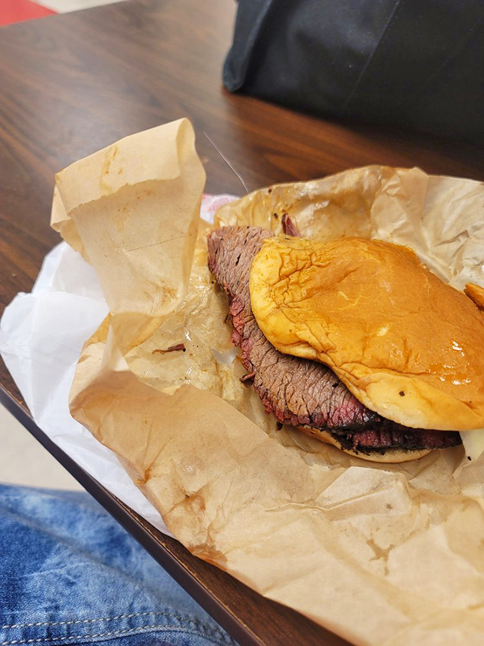 A brisket sandwich wrapped like a present because that's exactly what it is. Simple pleasures are often the most profound.