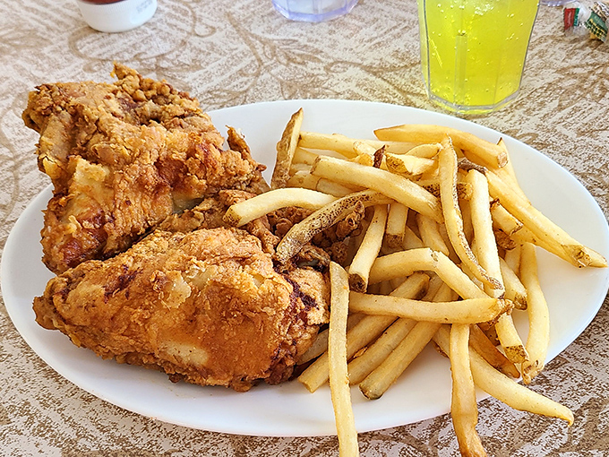 Broasted chicken with a crust so perfect it deserves its own fan club. Paired with hand-cut fries, it's comfort food elevated to an art form.