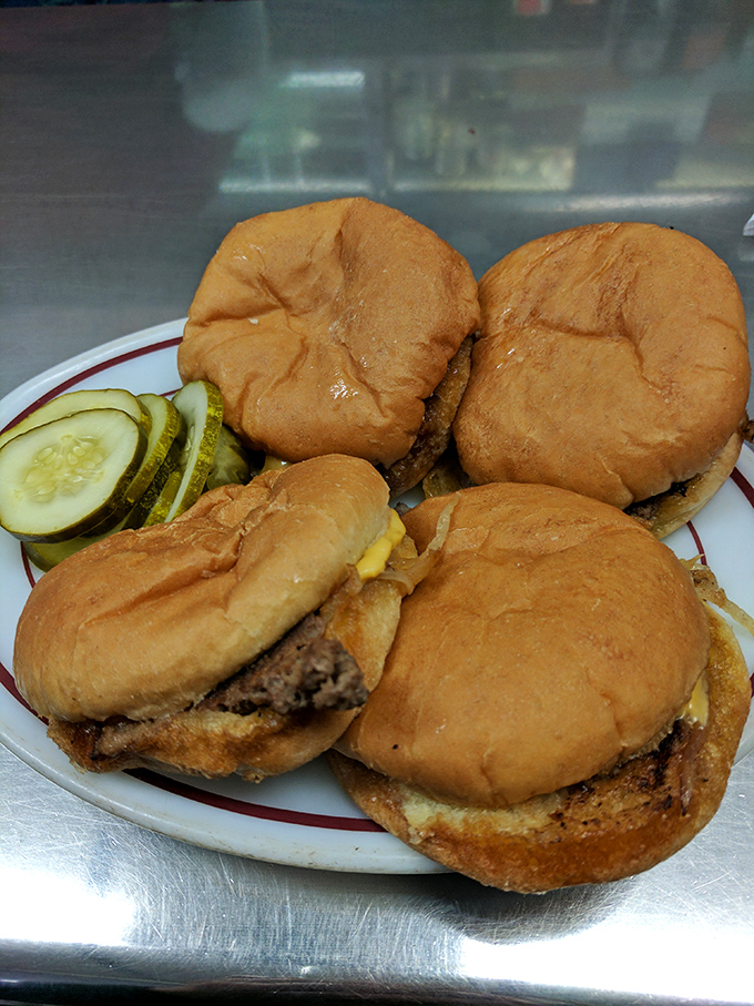 Sliders that don't need gourmet toppings or fancy names&mdash;just the perfect sear, a soft bun, and the willpower to not order four more.