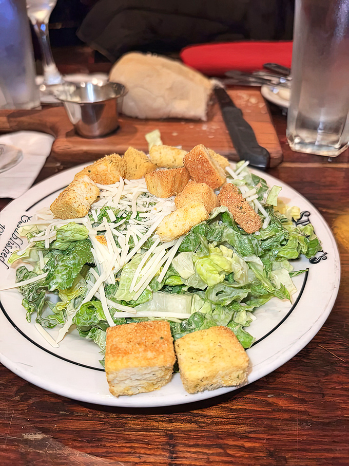 A Caesar salad that Julius himself would approve of—crisp, perfectly dressed, and adorned with house-made croutons that crunch like satisfaction itself.