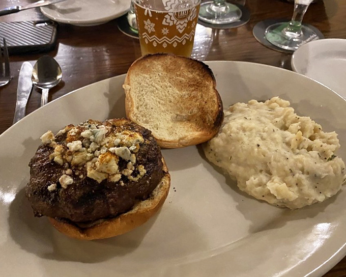This isn't just a burger &ndash; it's architecture with flavor. The blue cheese and toasted bun create a perfect foundation for beef brilliance.