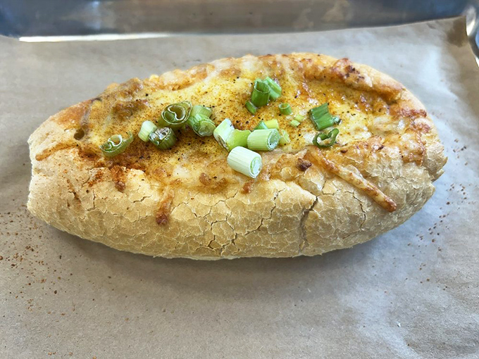 This isn't just bread&mdash;it's a canvas of flavor topped with green onions and spices. One bite and you'll wonder where this has been all your life.