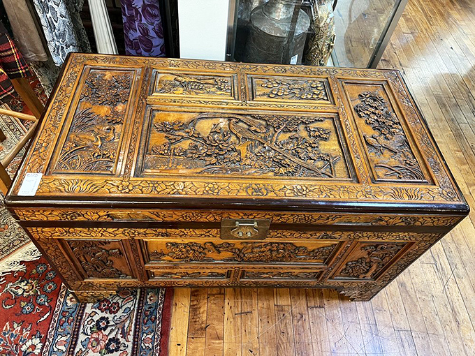 This isn't just a wooden chest&mdash;it's a masterpiece of carved storytelling, each panel a chapter in an epic tale told through patient craftsmanship.