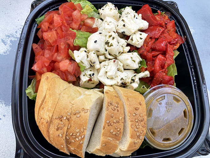 Fresh mozzarella, tomatoes, and basil prove Campo's excellence extends beyond meat &ndash; a Mediterranean vacation between two slices of bread.