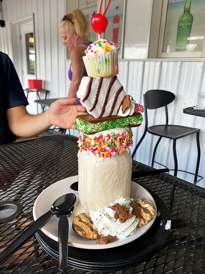 This isn't just a milkshake&mdash;it's a towering monument to dessert excess, stacked with cookies, cupcakes, and enough whipped cream to make a dairy farmer blush.