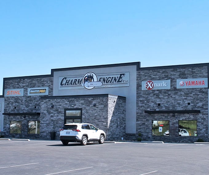 Charm Engine proves that even in Amish Country, modern tools have their place. The irony of power equipment in a horse-powered community isn't lost here.