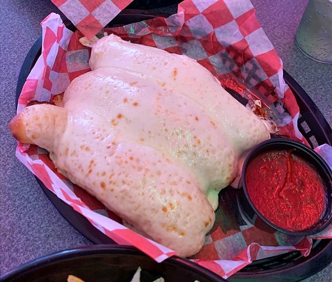 Not just cheese breadsticks&mdash;these are pillowy vessels of melted perfection with marinara that's clearly been simmering since breakfast. Comfort food that hugs you from the inside. 