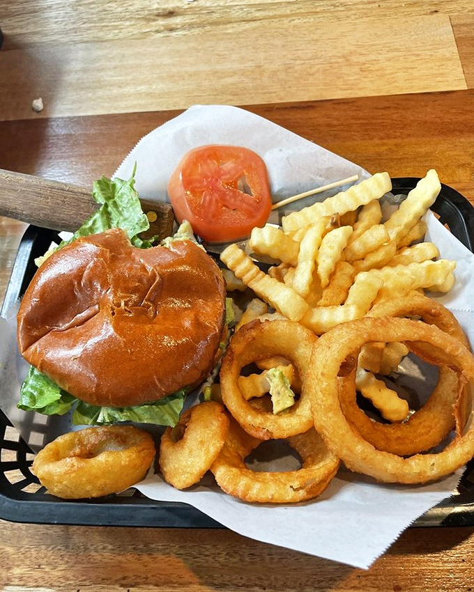 A burger with attitude, fries with purpose, and onion rings with ambition&mdash;this plate has more personality than most people I know.
