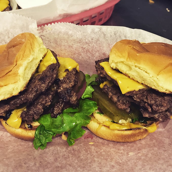 These aren't just cheeseburgers &ndash; they're happiness on a bun, where melted American cheese, crisp lettuce and juicy beef create a symphony of comfort.