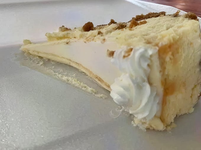 Cheesecake that makes you pause mid-conversation&mdash;creamy, light, and the perfect sweet counterpoint to all that savory chicken goodness.