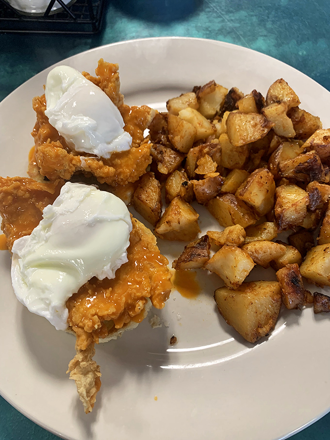 Crispy chicken crowned with perfectly poached eggs alongside golden home fries. A breakfast worthy of setting your alarm for, even on weekends.