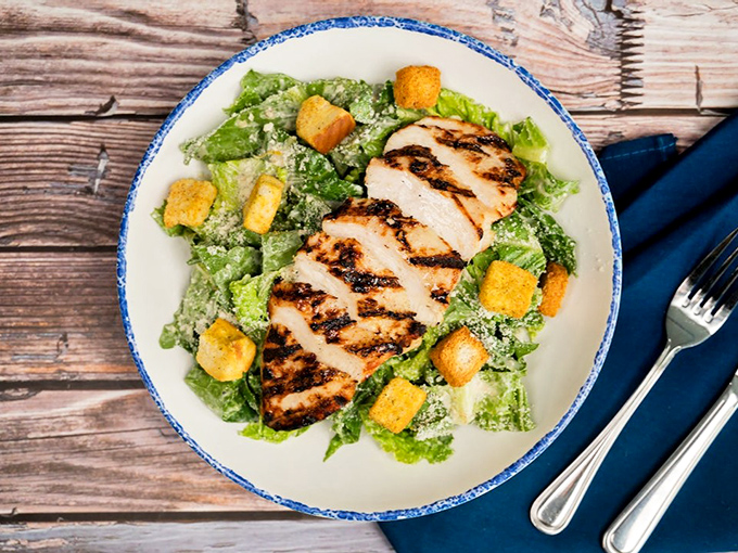 A Caesar salad that Julius himself would approve of, where grilled chicken and romaine have achieved perfect diplomatic relations.