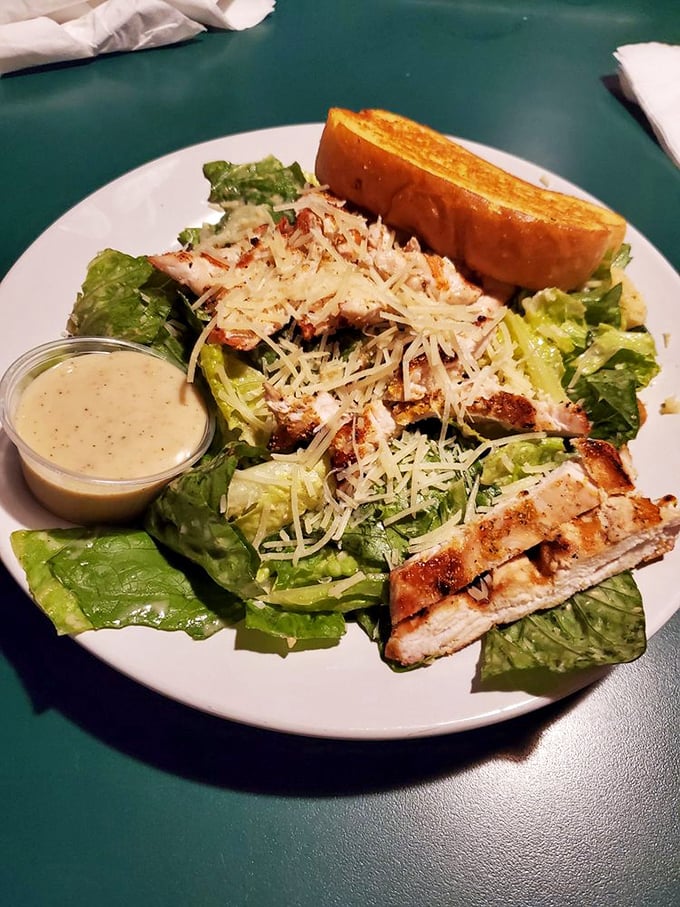 A Caesar salad that Julius himself would approve of&mdash;crisp romaine, perfectly grilled chicken, and a side of garlic bread for good measure.
