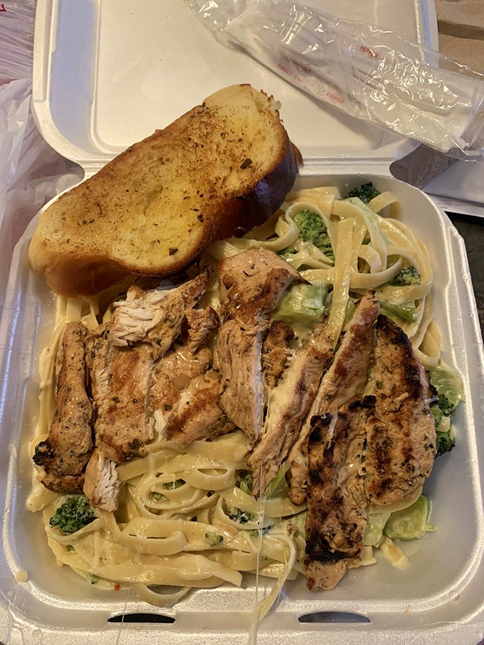 Even in takeout form, this Chicken Fettuccine Alfredo maintains its dignity&mdash;tender chicken, al dente pasta, and sauce that clings to every strand.