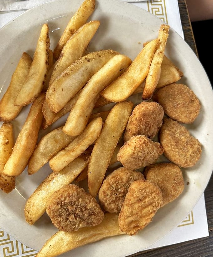 Fries and nuggets that prove comfort food doesn't need to be complicated. Sometimes happiness is just perfectly fried potatoes with crispy chicken companions.