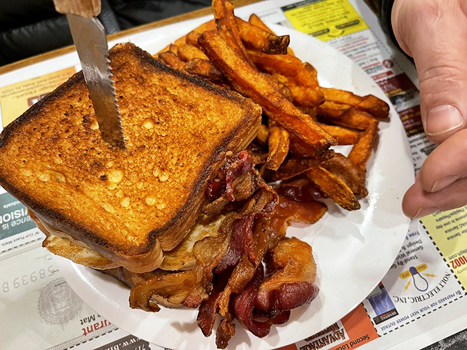 A perfectly grilled sandwich with sweet potato fries. Sometimes the simplest combinations create the most profound satisfaction&mdash;like Paul Simon meeting Art Garfunkel.