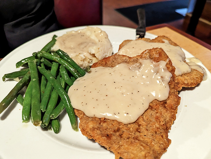 Chicken fried steak so generous it requires strategic planning and possibly a designated driver for your fork.