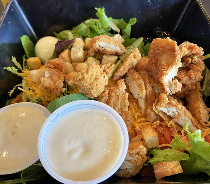This chicken salad proves that sometimes the best adventures come disguised as sensible choices with crispy coating.