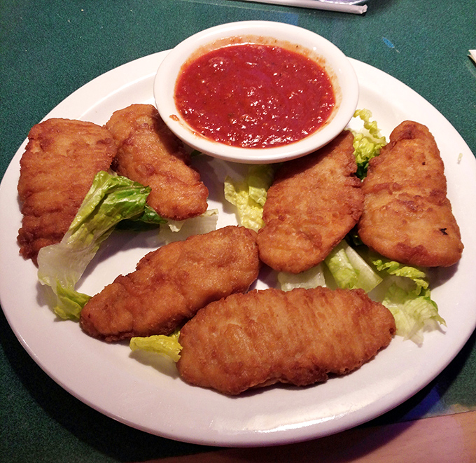 Chicken tenders that have achieved the golden-brown perfection that frozen versions at home can only dream about becoming.