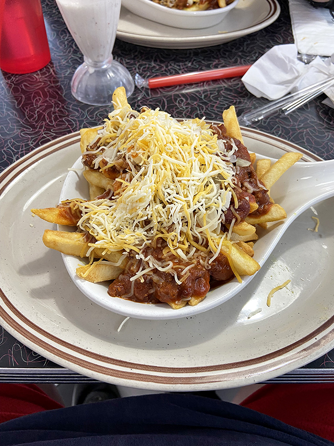 Chili cheese fries aren't just a side dish here&mdash;they're an event. That mountain of cheese could solve any problem you're currently facing.