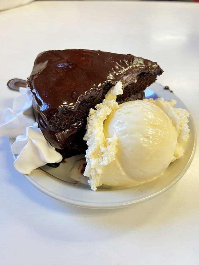 This chocolate cake doesn't just satisfy cravings&mdash;it creates them. The vanilla ice cream isn't a side dish; it's a necessary companion on this journey.