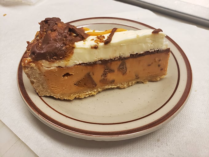 Reese's cheesecake that makes sharing a moral dilemma. The layers of chocolate and peanut butter create a dessert that's worth every moment on the treadmill tomorrow.
