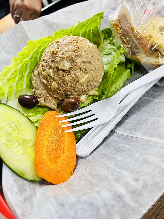 Chopped liver&mdash;the p&acirc;t&eacute; of the people&mdash;served with the respect it deserves on crisp lettuce with traditional garnishes.