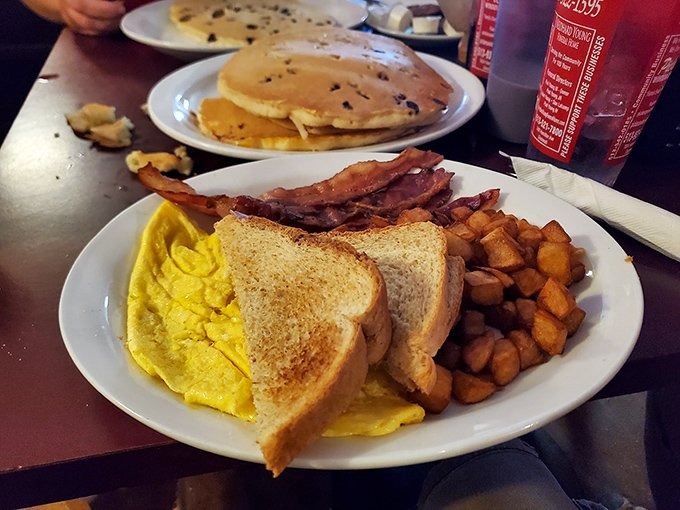 The breakfast plate that answers the eternal question: "Why yes, you can start your day with a perfect trifecta of eggs, bacon, and potatoes."