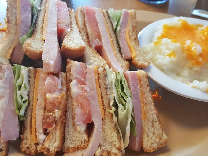 The club sandwich: architectural marvel of the diner world, where each perfectly stacked layer deserves its own round of applause.