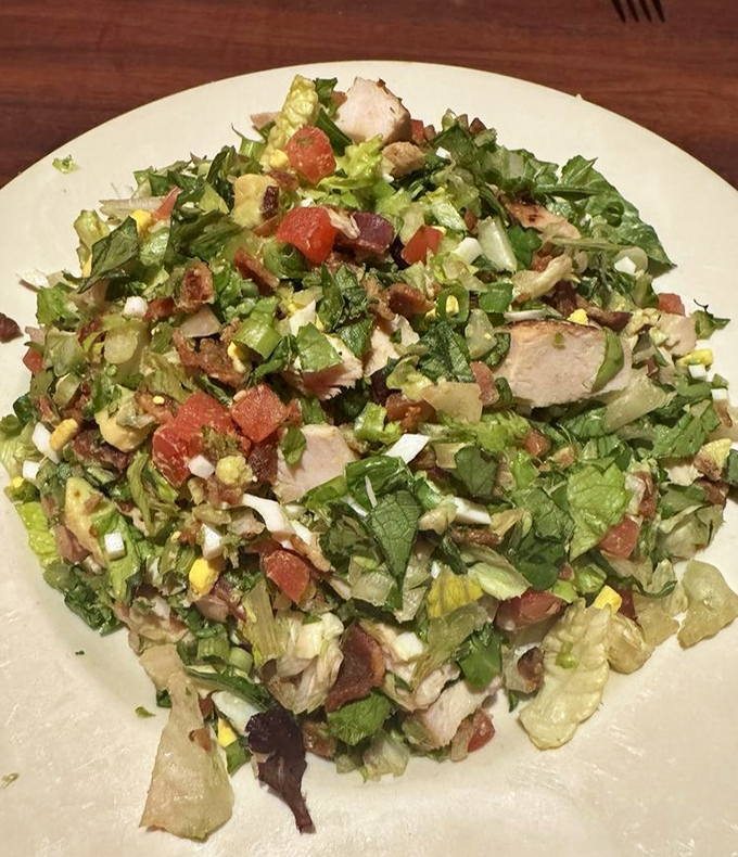 This isn't just a Cobb salad &ndash; it's a masterclass in chopped perfection where every ingredient gets equal billing in the flavor symphony.