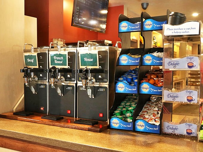Coffee station that understands morning emergencies require options. The three pots stand ready like caffeinated superheroes waiting to save your day.