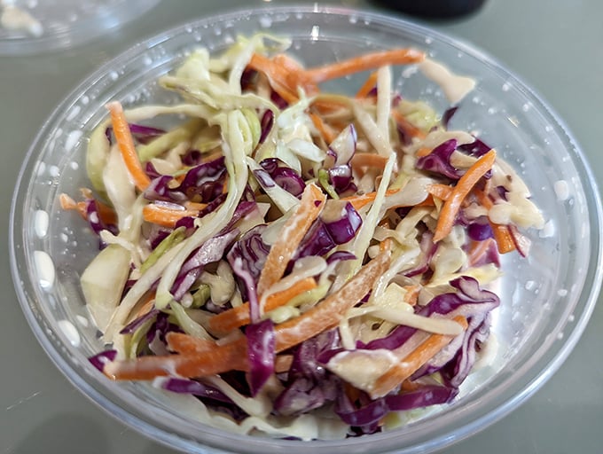 Coleslaw that actually deserves table space &ndash; crisp, colorful, and far from the soggy afterthought served at lesser establishments.
